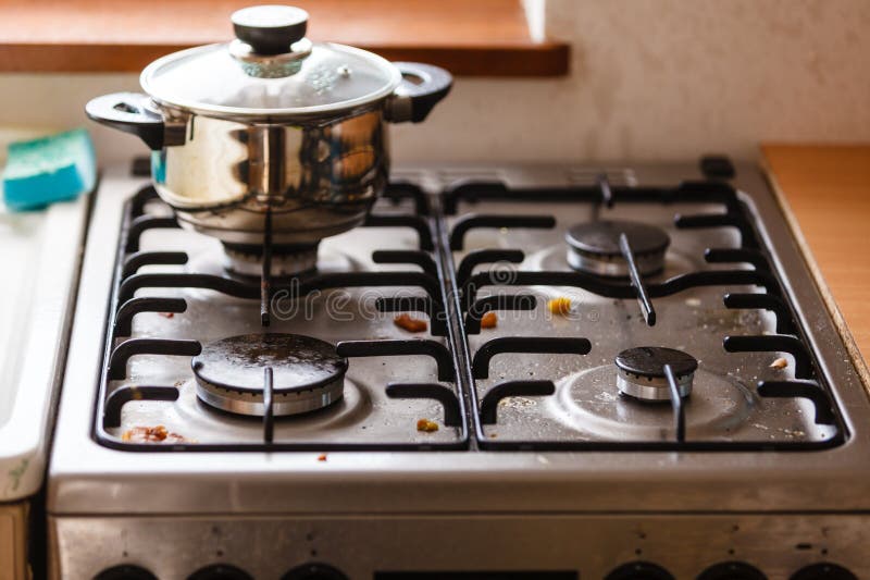 Gas plate with pot lid stock photo. Image of kitchen - 148894892