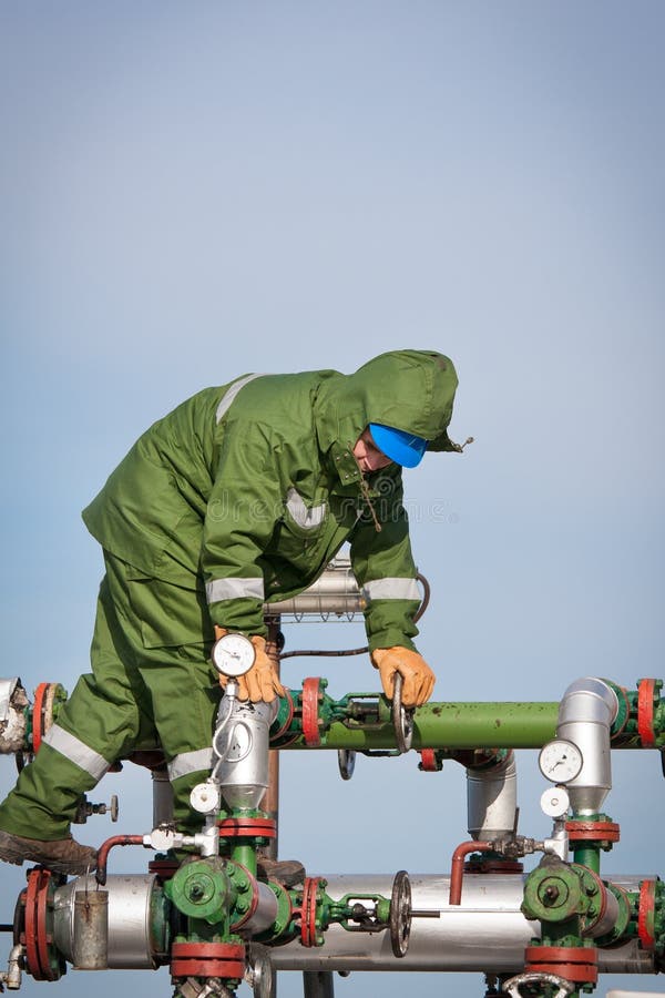 Oil Refinery Safety Inspector Stock Image - Image of petroleum, bush ...