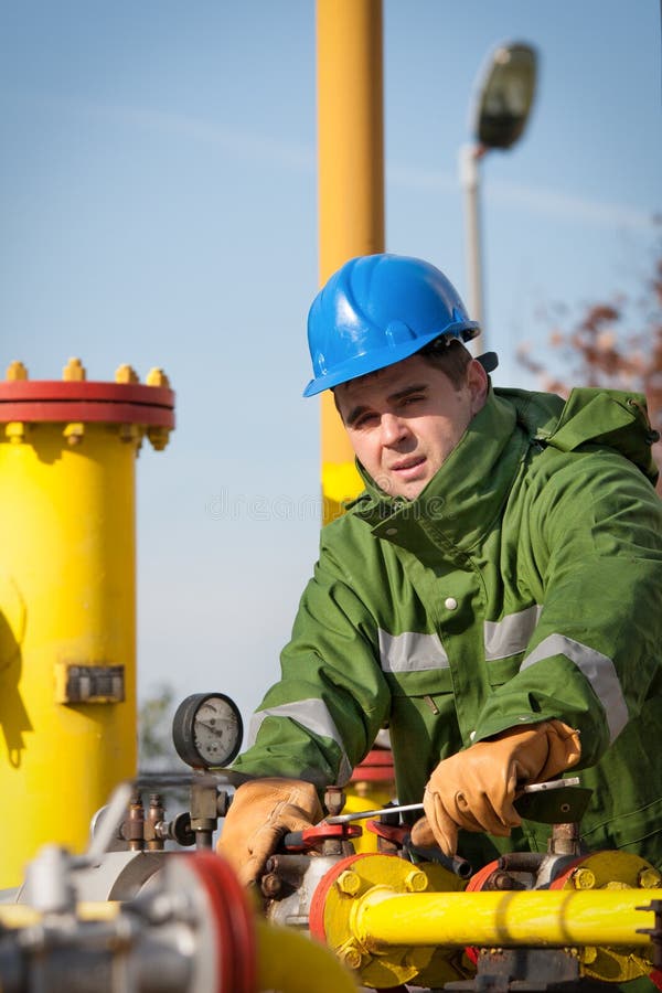 Engineer in an Oil field stock image. Image of inspector - 21478113