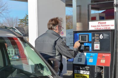 At the Gas Pump stock photo. Image of senior, card, interface - 24756818