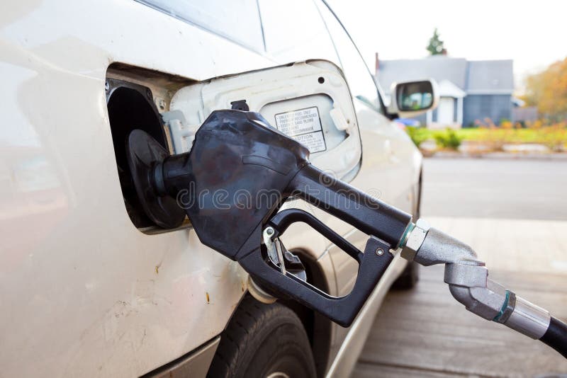 Gas Pump Fueling Car stock image. Image of petrol, automotive - 35634127