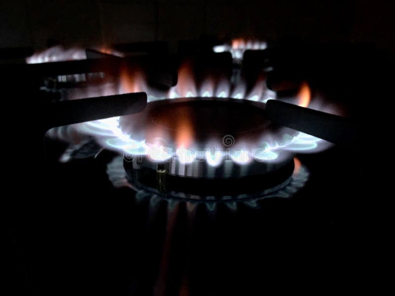 Gas rings on a cooker hob stock image. Image of flame - 266658491