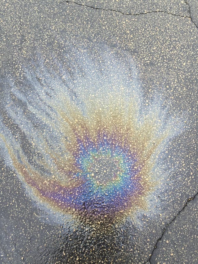Gas stain in the rain stock photo. Image of rainbow, water - 72410952