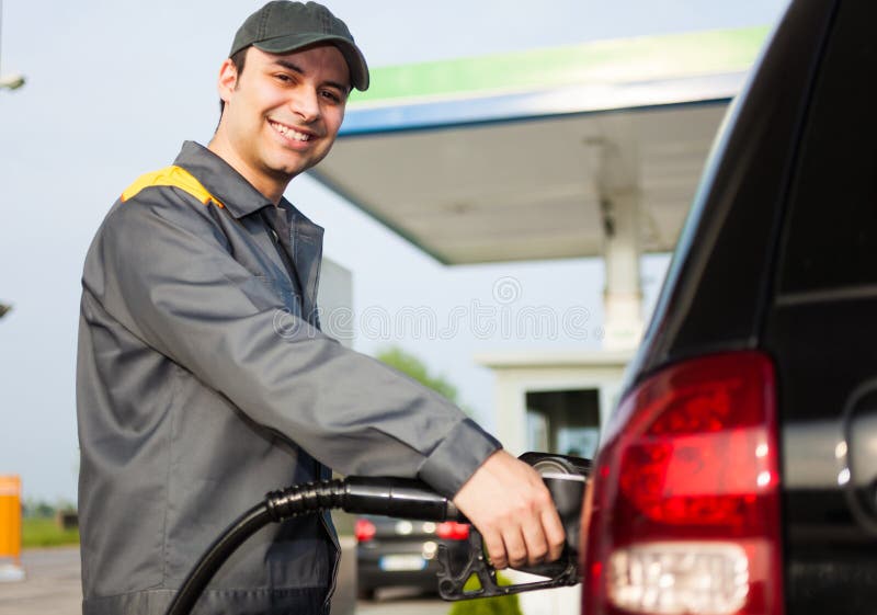 Gas Station Attendant at Work Stock Image - Image of cost, attendant ...