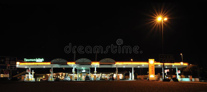 Gas Station with Cars Inside Editorial Stock Image - Image of nightly ...