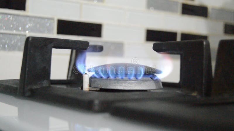 Gas Stove Burning in the Kitchen, Blue Flames Black Background Stock ...