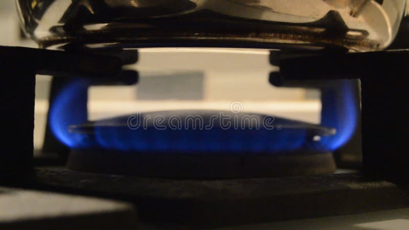 Gas Stove Burning in the Kitchen, Blue Flames, Cooking on the Stove ...