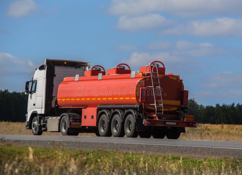 Gas-tank goes on highway stock image. Image of commerce - 246535833