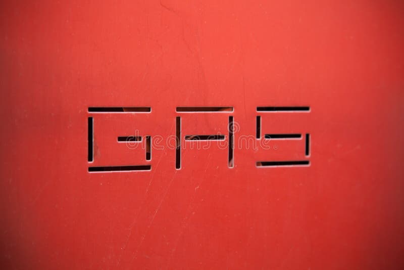 Gas title on red surface stock image. Image of inscription - 41595063