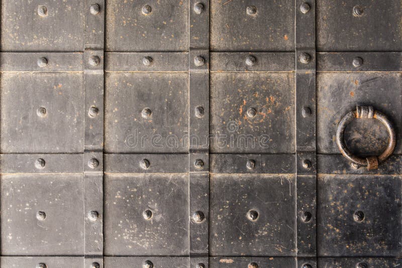 The Gate of the Ancient Fortress is Covered with Iron Stock Image ...