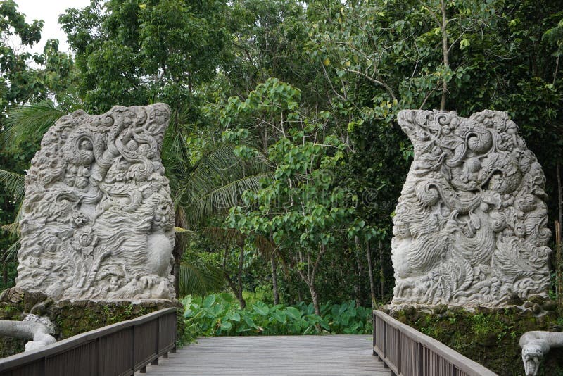 Gate in Bali with the Jungle in the Back Stock Photo - Image of statue ...
