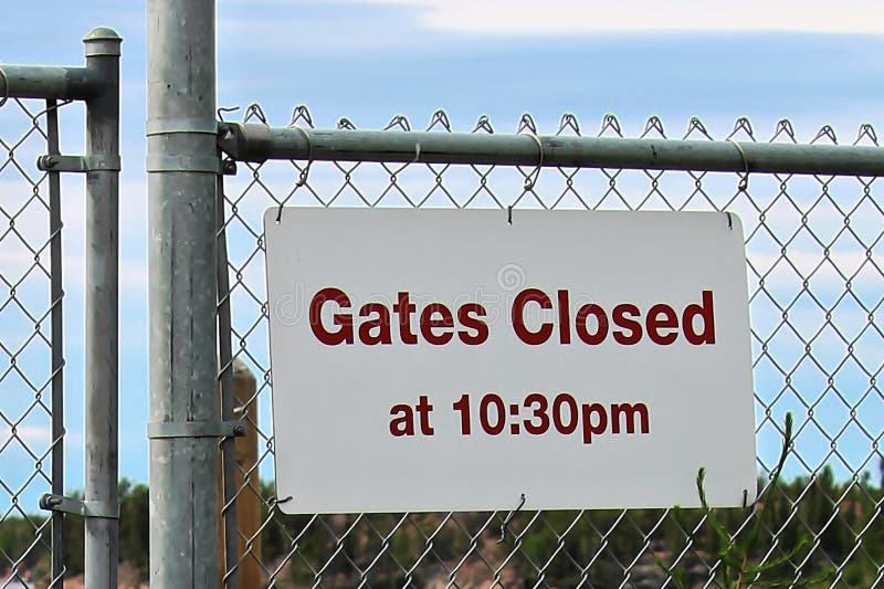 Gate Closes at 10:30 Pm Sign at a Beach Stock Photo - Image of location ...