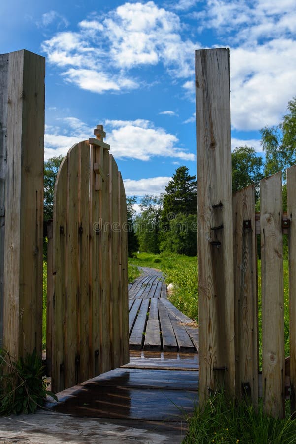 The gate with a cross stock photo. Image of opened, doorway - 59306218