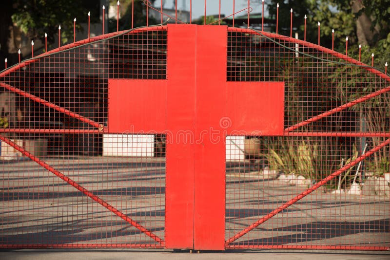 Gate with a cross in red stock photo. Image of fence - 37050474