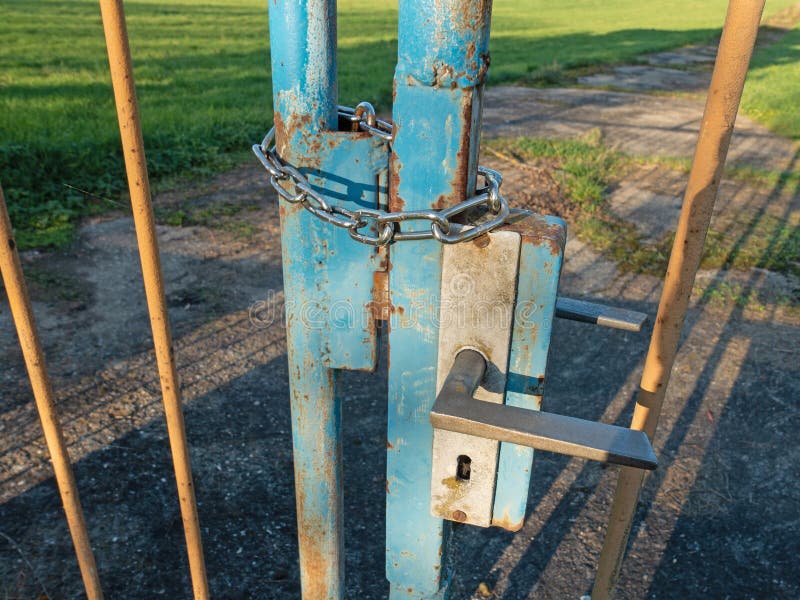 Gate locked with a chain stock image. Image of risk - 394907553