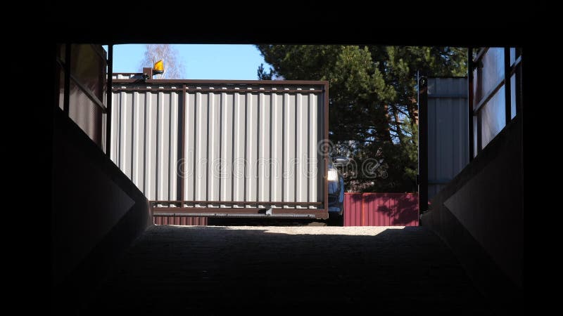 Automatic Gates on a Remote Control Open before Entering the Courtyard ...