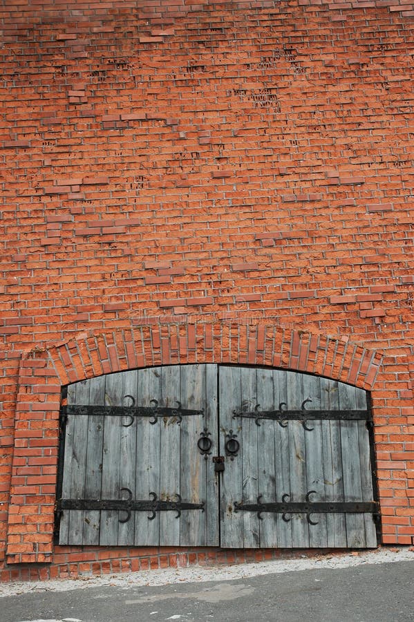 Gate in the red brick wall stock image. Image of front - 215983781