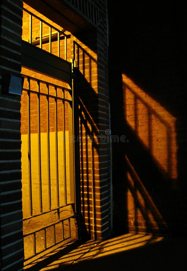 Gate and shadows at night stock photo. Image of gateway - 10247728
