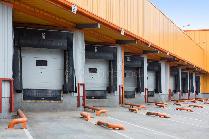 Big Distribution Warehouse with Gates for Loads and Trucks Stock Photo ...