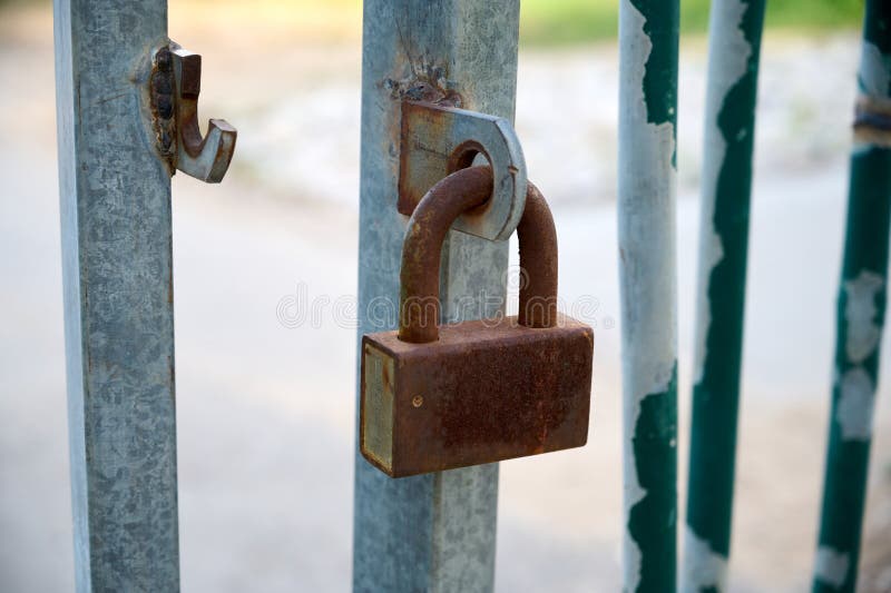 The Gates are Broken Open and on One Leaf There is a Closed Padlock ...