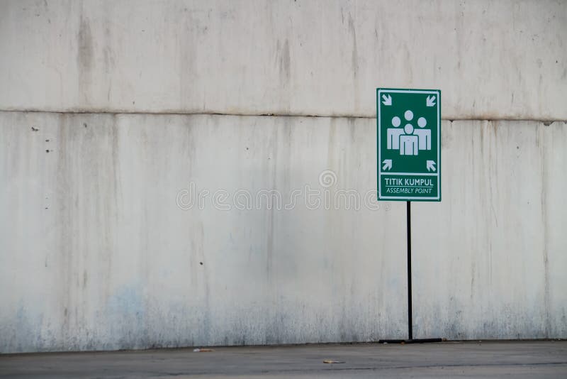 Gathering Point Signs in the Middle of the Field in the Warehouse Area ...