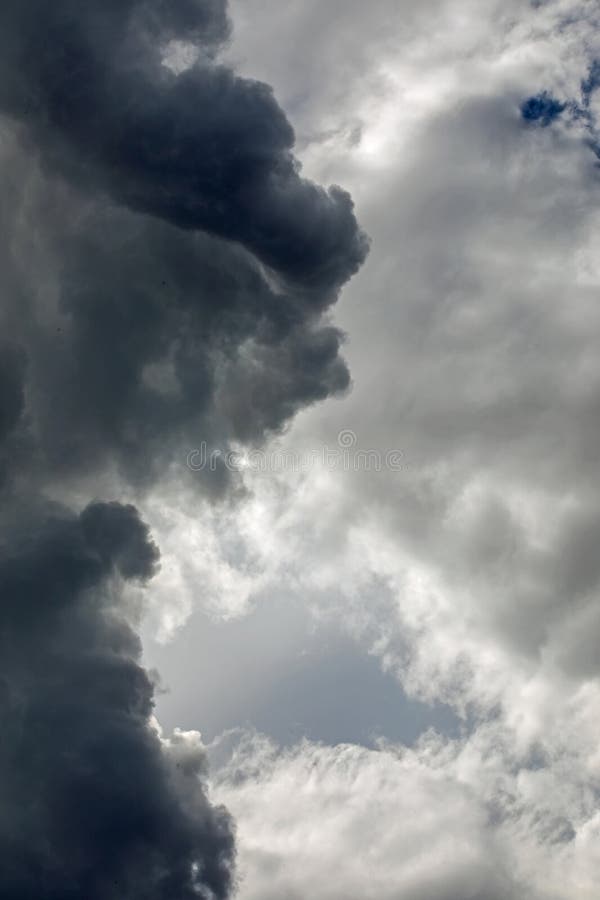 Gathering Storm Clouds Illuminated by the Sun Stock Image - Image of ...