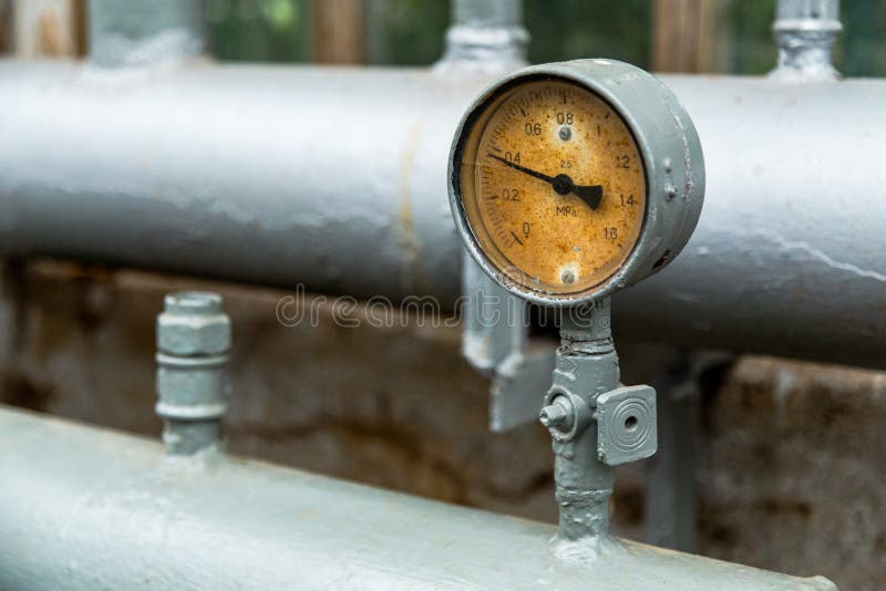 Industrial Pressure Meter - Barometer and Water Pipes in the Background ...