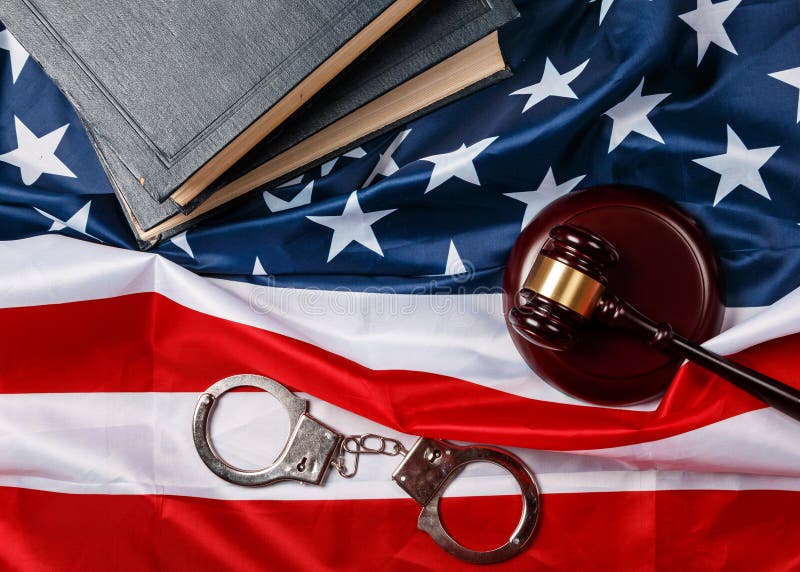 Gavel, books and handcuffs stock image. Image of judicial - 58128683