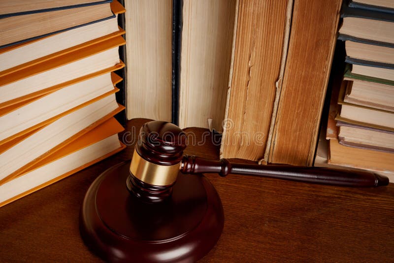 Gavel, books and handcuffs stock image. Image of judicial - 58128683