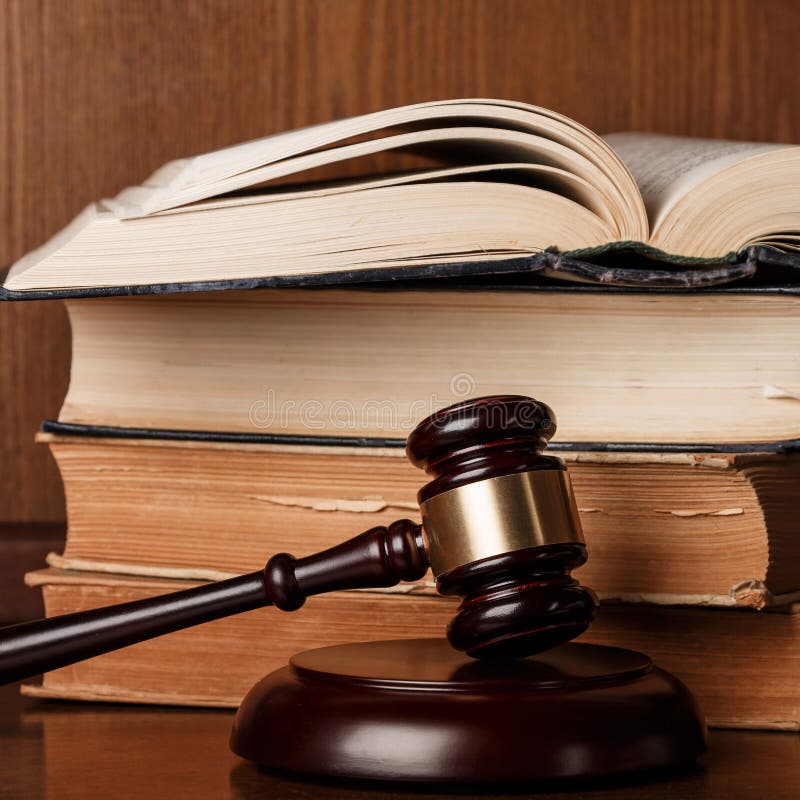 Gavel, books and handcuffs stock image. Image of judicial - 58128683