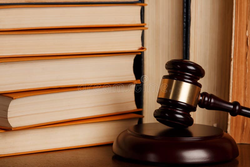 Gavel, books and handcuffs stock image. Image of judicial - 58128683