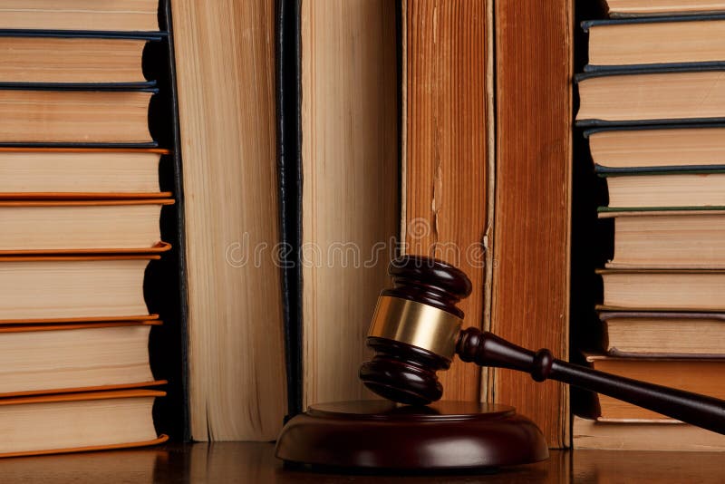 Gavel, books and handcuffs stock image. Image of judicial - 58128683