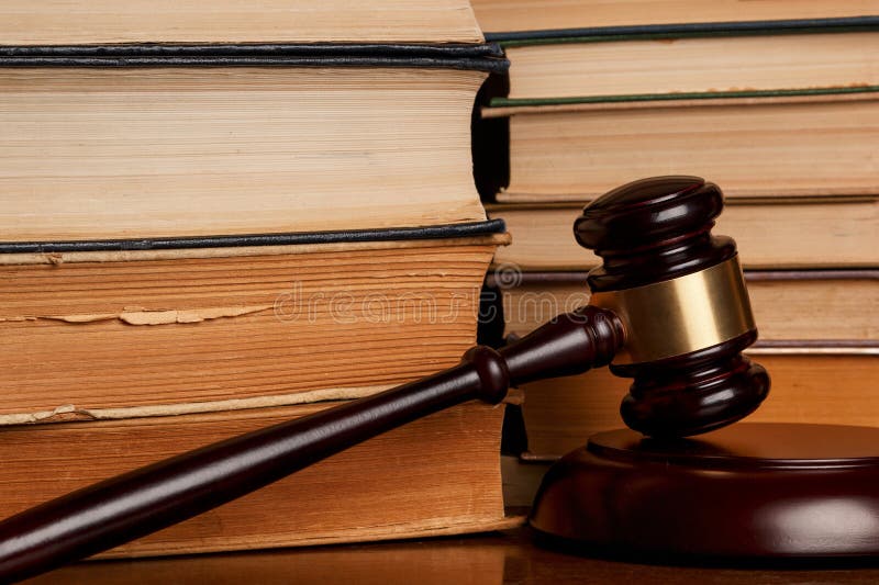 Gavel, books and handcuffs stock image. Image of judicial - 58128683