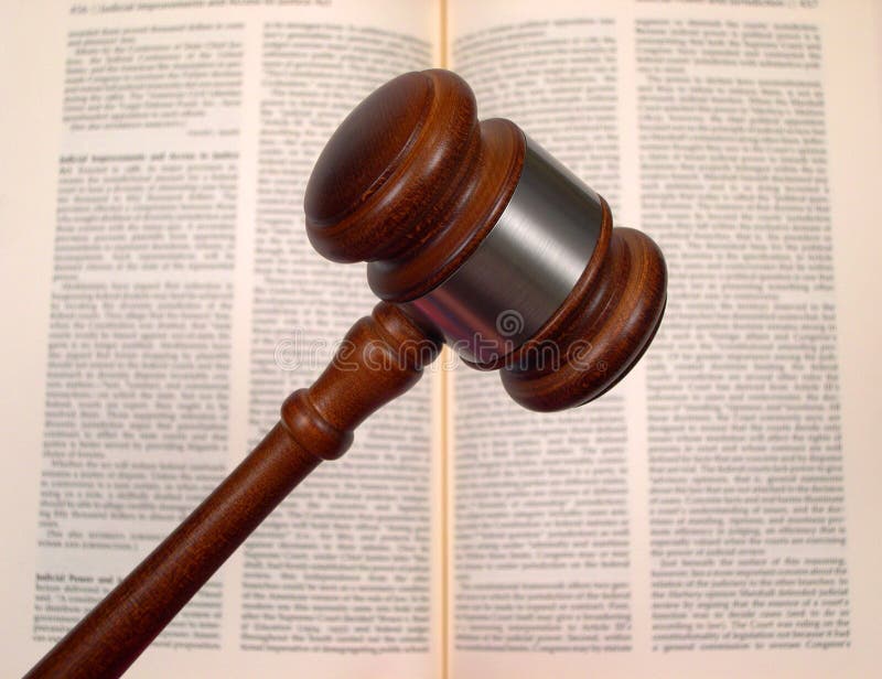 Gavel over law book stock image. Image of punishment, witness - 126069