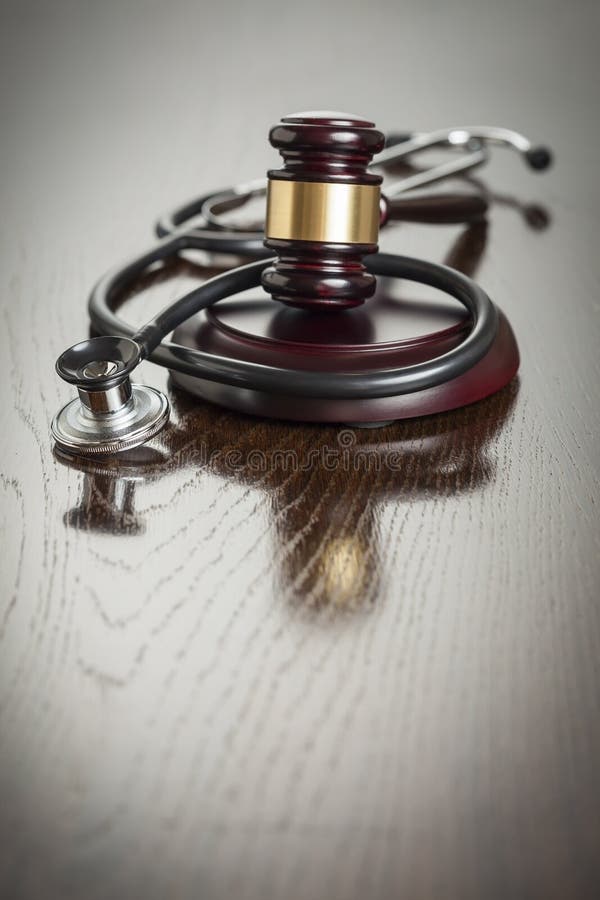 Gavel and Stethoscope on Gradated Background Stock Image - Image of ...