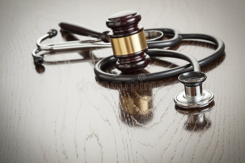 Gavel and Stethoscope on Gradated Background Stock Photo - Image of ...