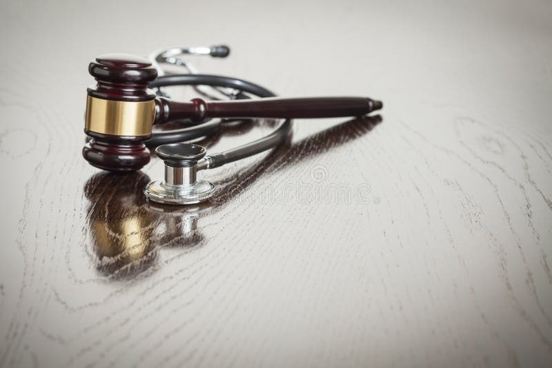 Gavel and Stethoscope on Gradated Background Stock Photo - Image of ...