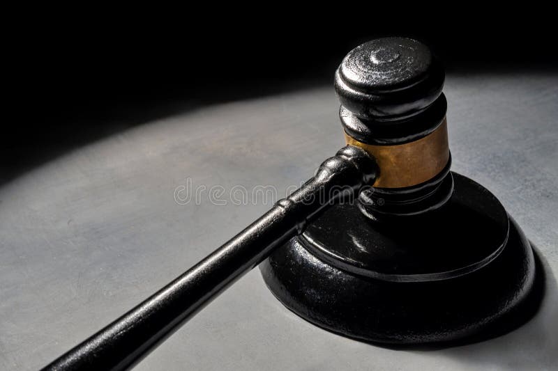 A Gavel on a Surface Illuminated by a Single Light Source, Casting a ...