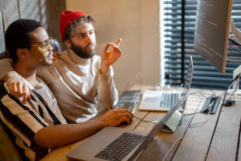Gay Couple Working on Computers at Home Office Stock Photo - Image of ...