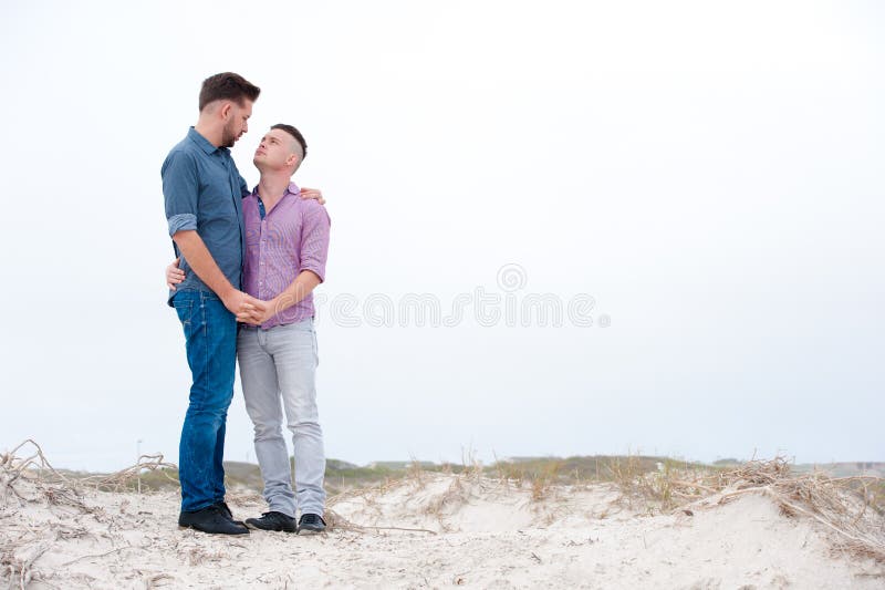Gay Men Embracing on a Beach Stock Photo - Image of adult, couple: 70931284 Gay Men Embracing on a Beach Stock Photo - Image of adult, couple: 70931284