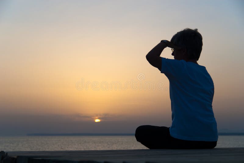 Gaze on the horizon stock photo. Image of sitting, sunset - 12821254