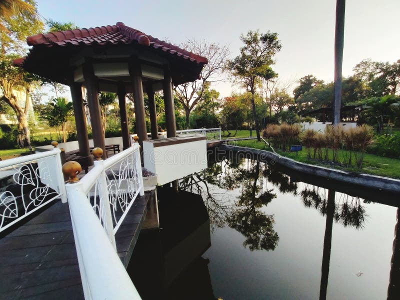 A Gazebo on the Fish Pond at Park in the Morning View Stock Photo ...