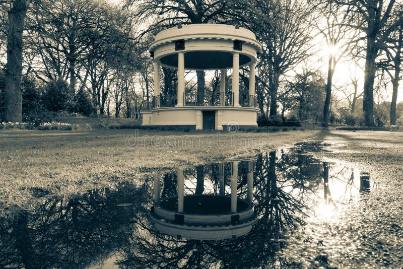 Gazebo Near the Puddle in a Garden Stock Image - Image of natural ...