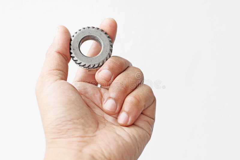 Gear in hand stock photo. Image of system, metallic, mechanic - 33904426