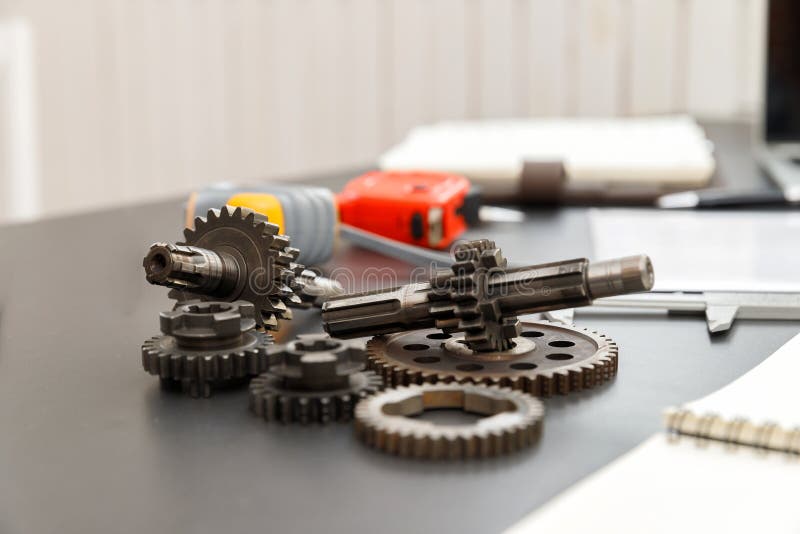 Gear with Machine Part on Engineer Desk Stock Image - Image of ...