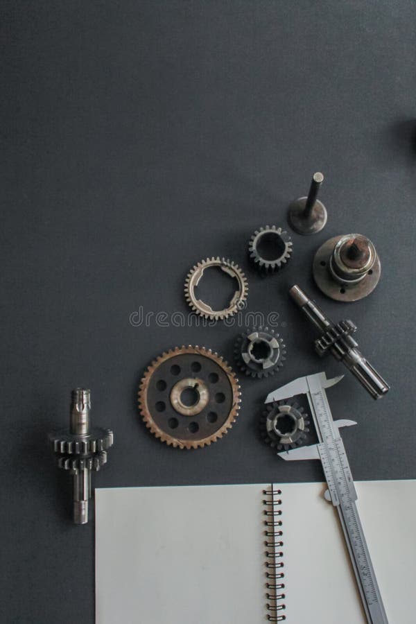 The Gear Set is Placed on the Workbench of a Team of Factory Mechanical ...