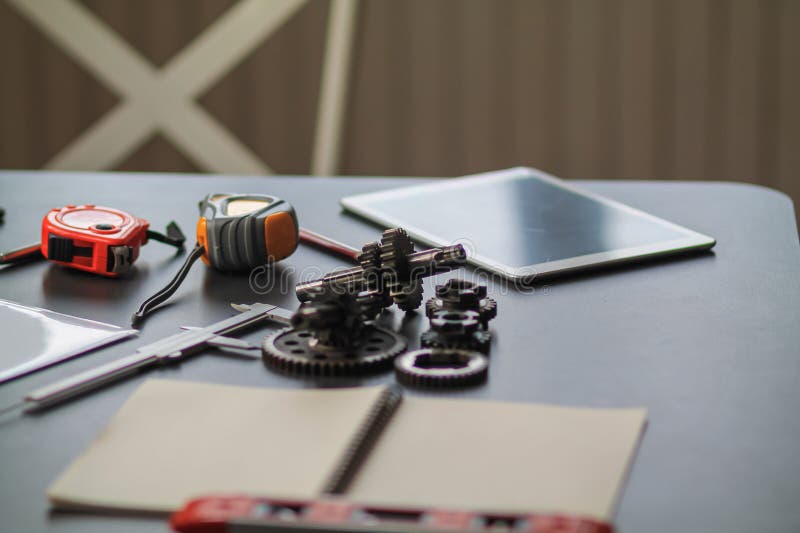 The Gear Set is Placed on the Workbench of a Team of Factory Mechanical ...