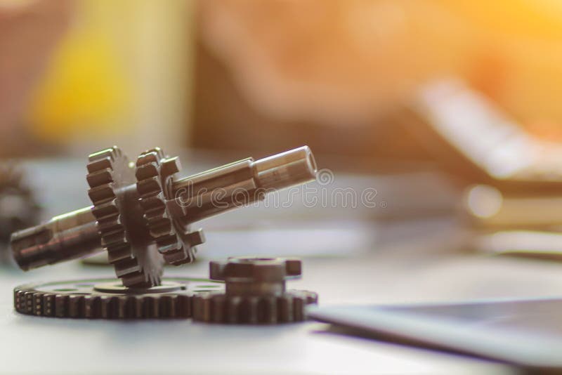 The Gear Set is Placed on the Workbench of a Team of Factory Mechanical ...