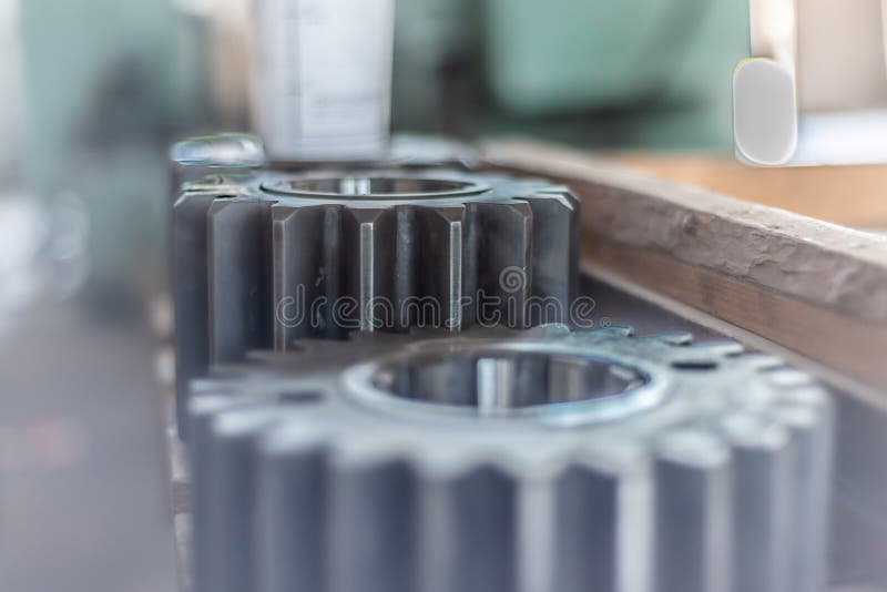 Gear Grinding Machine in Operation, Grinding of Teeth of a Wheel with ...