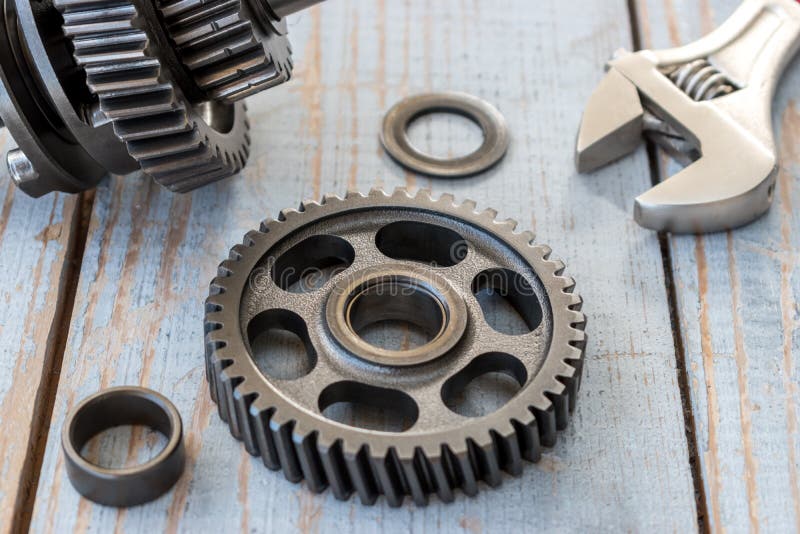 Gear Wheels on a Wooden Table Stock Photo - Image of gears, brown ...